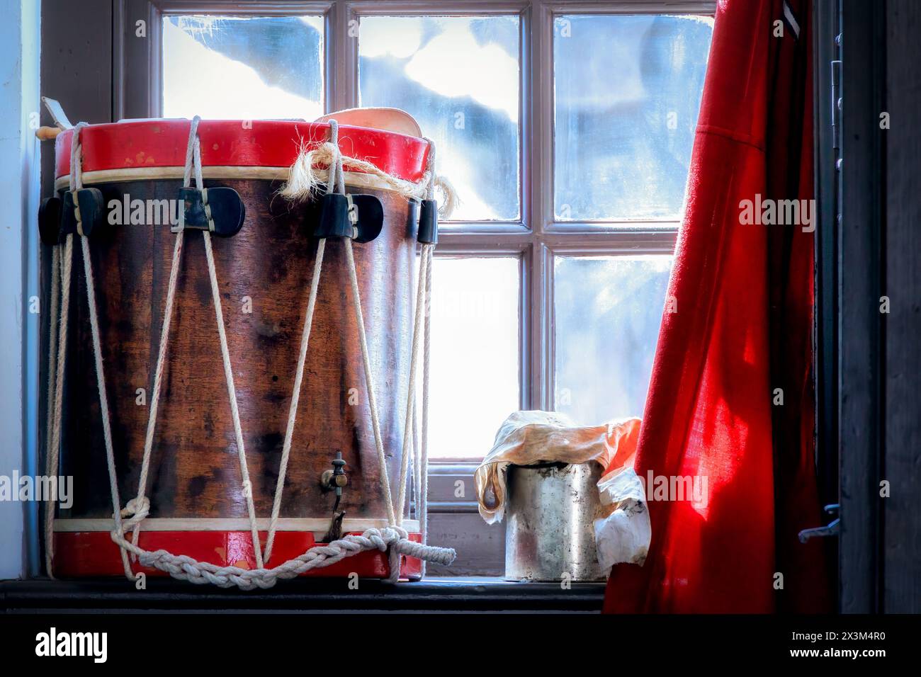 A field drum sits against the window in the Guard House at Colonial ...