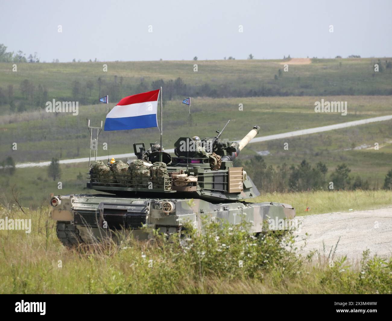 An M1A2 Abrams tank pulls forward to firing line at the Digital Multi ...