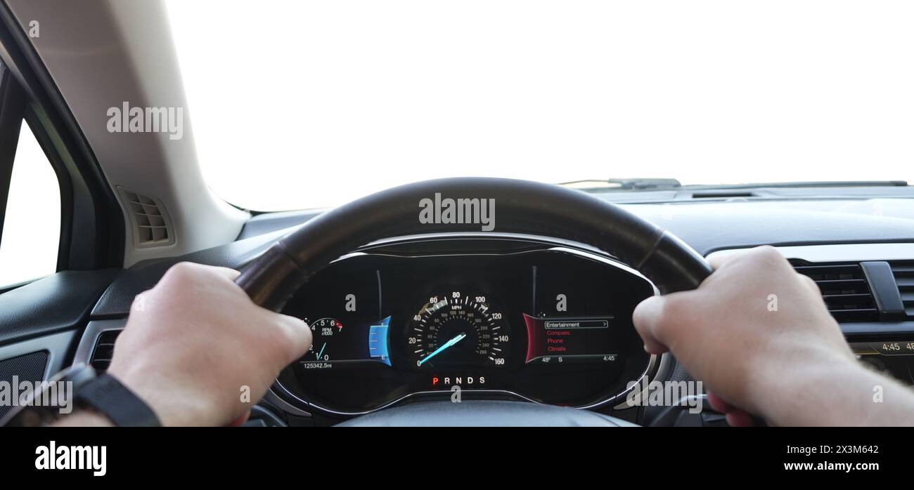 Man driving car with speedometer on dashboard, closeup Stock Photo - Alamy