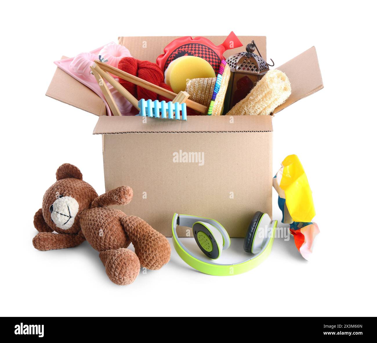 Box of unwanted stuff isolated on white Stock Photo - Alamy