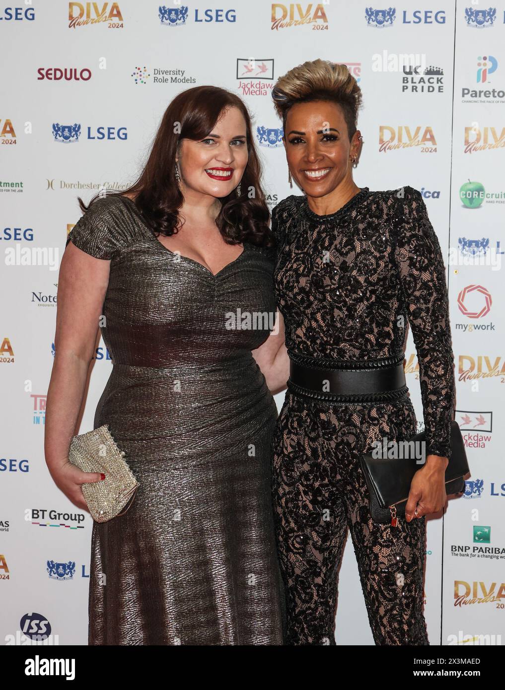 London, UK. 26th Apr, 2024. Roxy Bourdillon and Dame Kelly Holmes seen attending the DIVA Awards ...