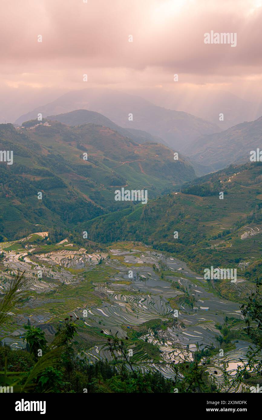 Beautiful sunset over Yuanyang Rice terraces in Laohuzui area, Yunnan ...