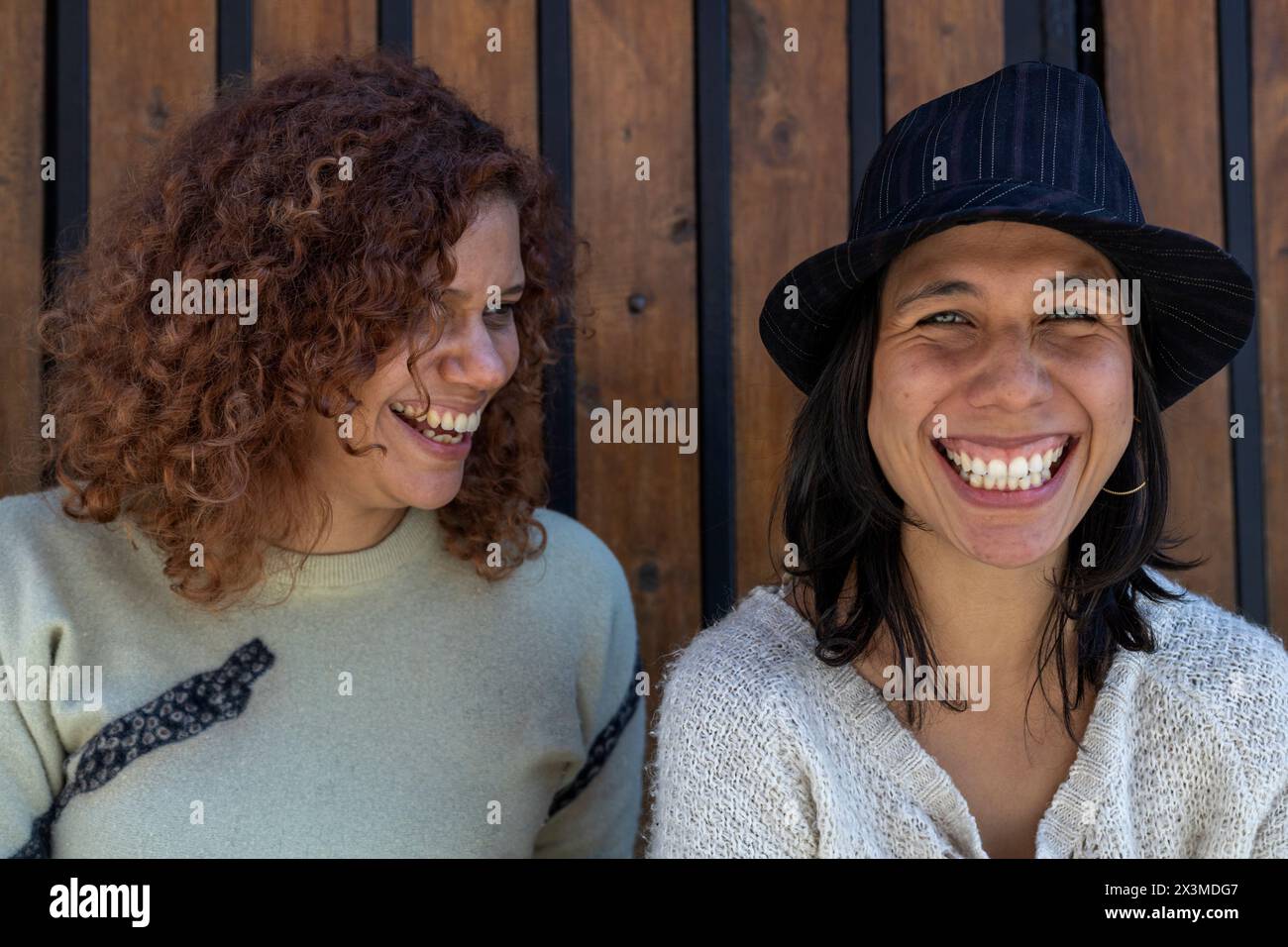 Two adult Latin American women (34 and 29) with green eyes, smiling ...