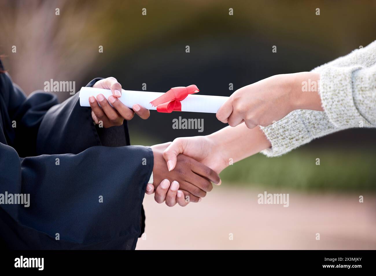 Handshake, graduation and certificate with congratulations for person ...