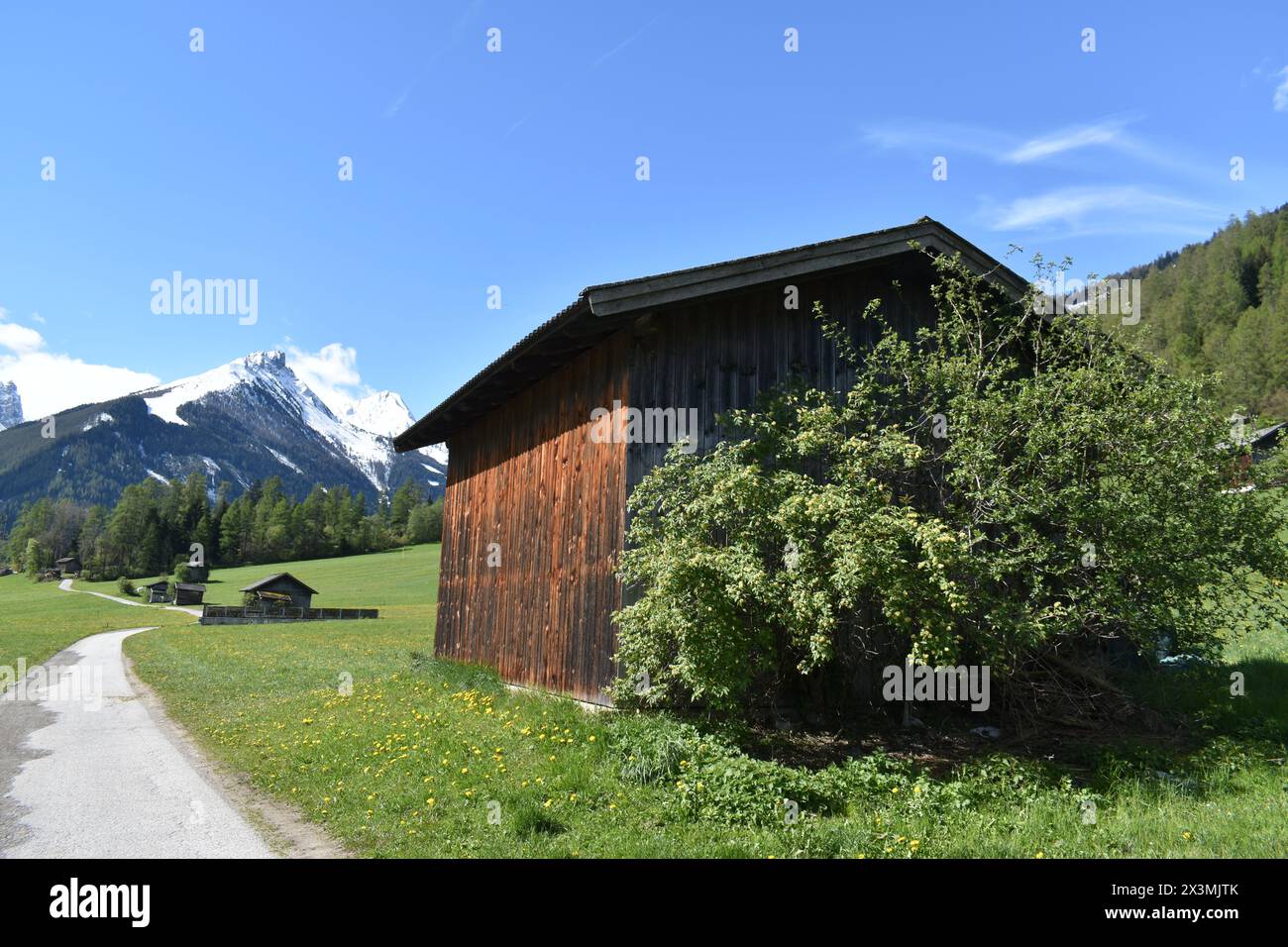 Beautiful landscape with old mountains log cabin high in the Austrian ...