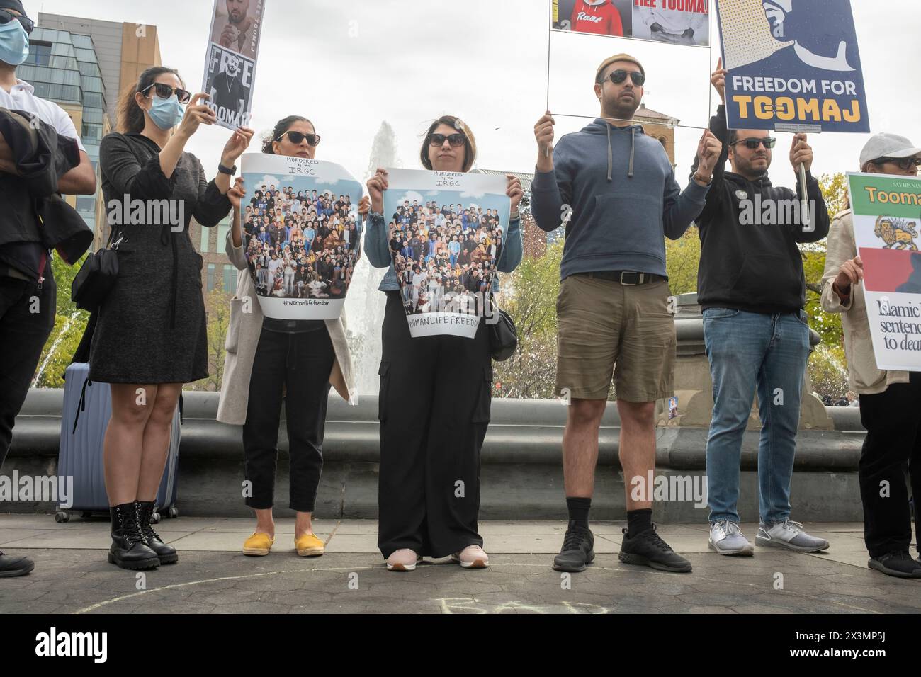New York, United States. 27th Apr, 2024. Protesters hold Iranian flags ...