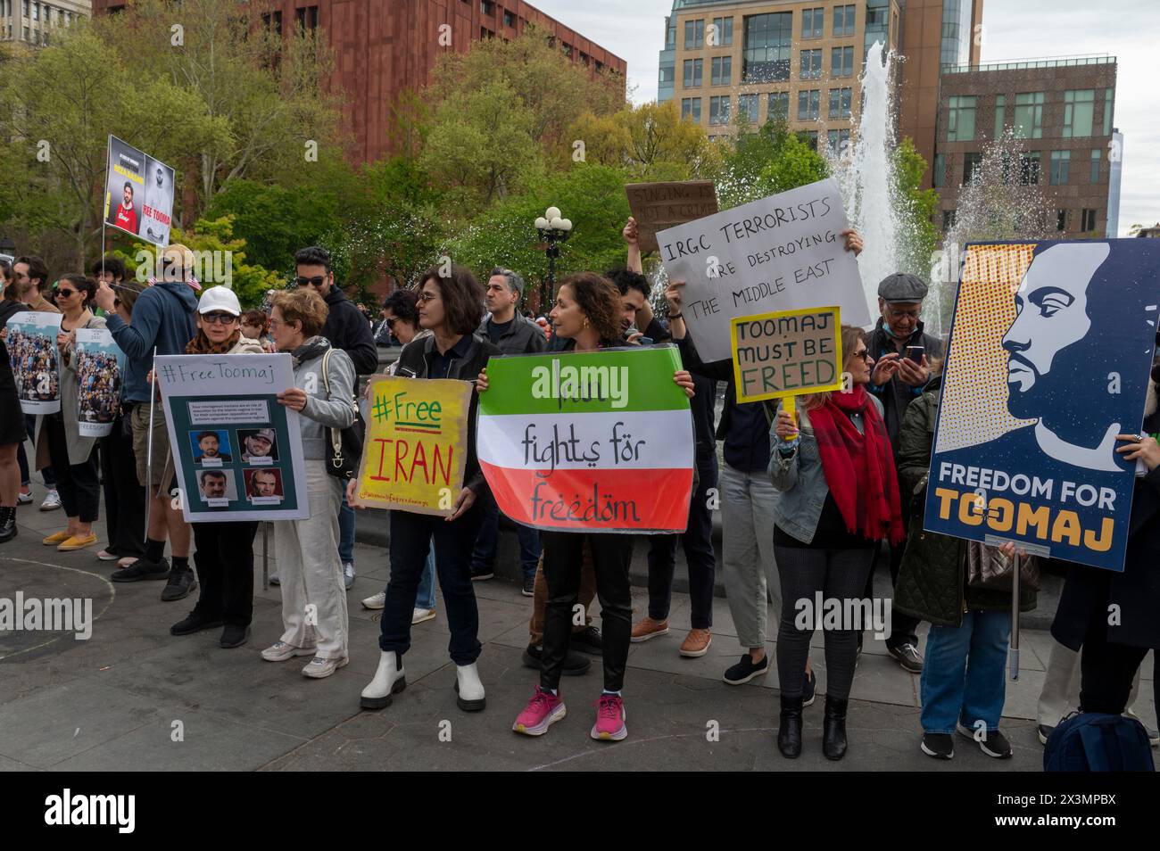 New York, United States. 27th Apr, 2024. Protesters hold Iranian flags ...