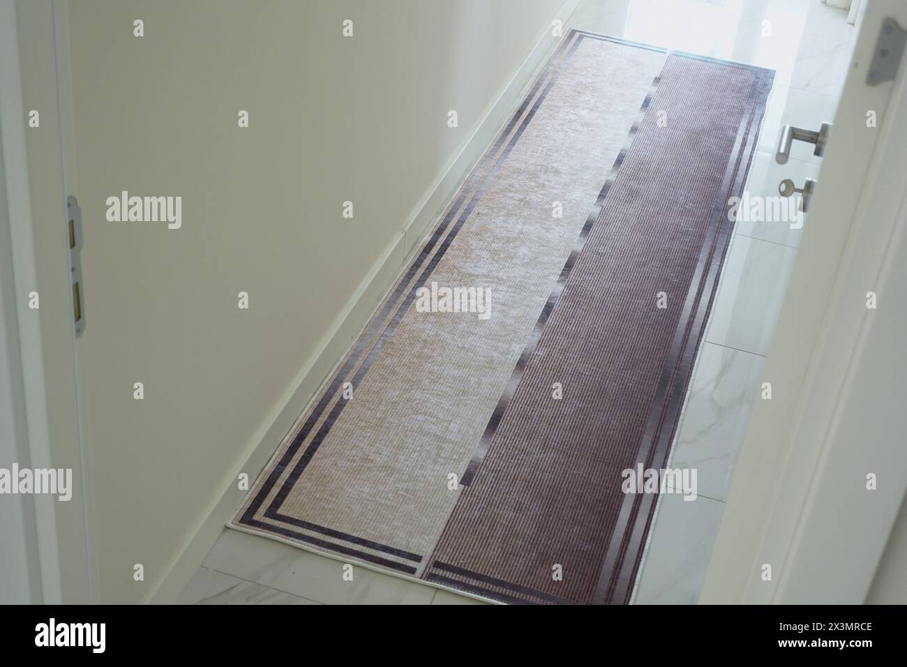 long carpet texture background on tiles floor Stock Photo - Alamy