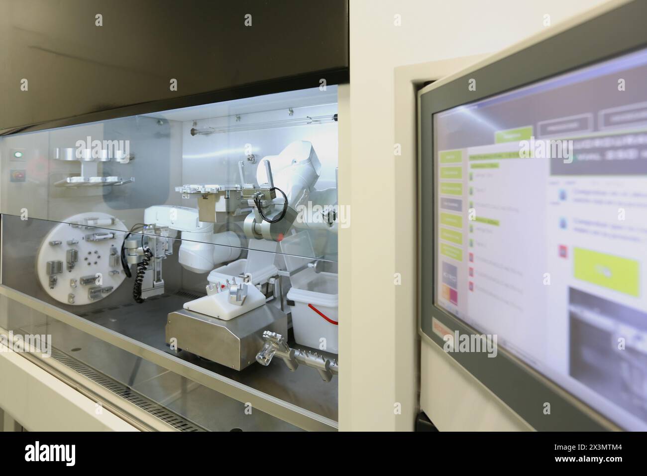 Kiro Oncology, Robotic self-cleaning hood for the compounding of ...