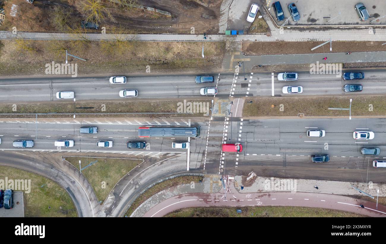 Drone photography of multiple lane road and pedestrian street crossing ...