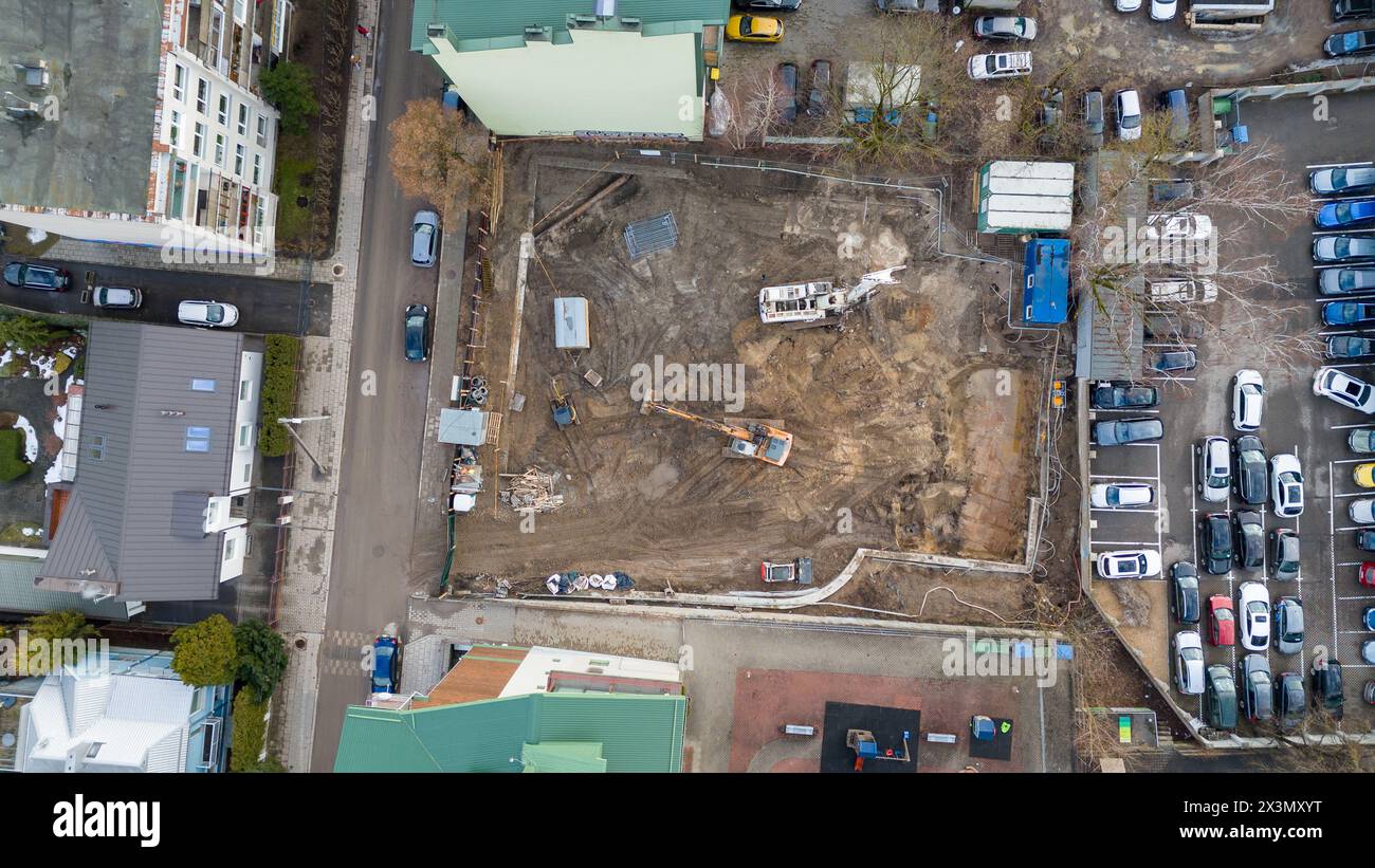 Drone photography of construction site in a site surrounded by other ...