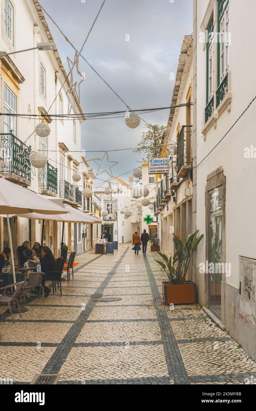 Tavira, Portugal, January 8, 2024. A cobblestone street in Tavira ...