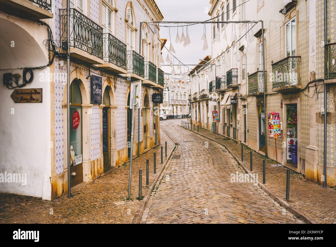 Tavira, Portugal, January 8, 2024. A cobblestone street in Tavira ...