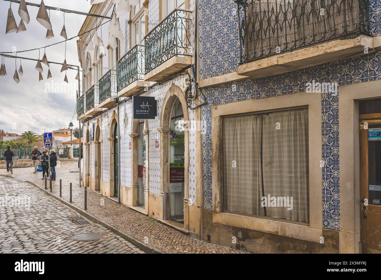 Tavira, Portugal, January 8, 2024. A cobblestone street in Tavira ...