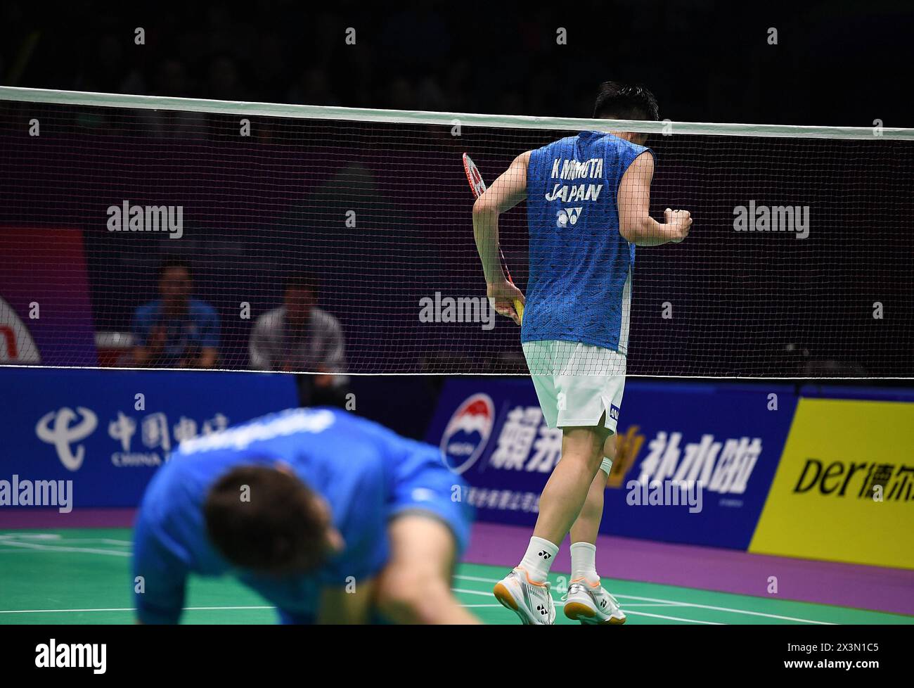 Chengdu, China's Sichuan Province. 28th Apr, 2024. Momota Kento (R) of ...