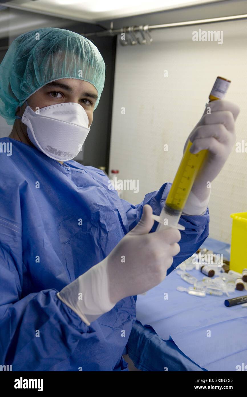 Pharmacy, drug preparation in hood, horizontal laminar flow cabinet ...