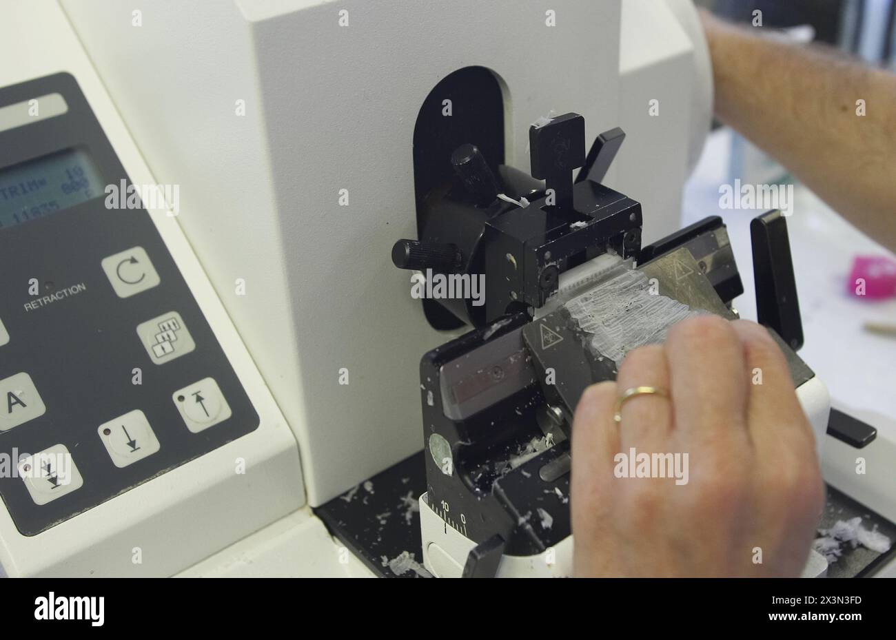 Rotary paraffin microtome, preparing tissue sample, pathological ...