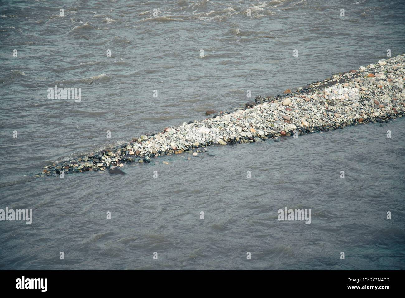 Shallow river and many river rocks. Low water season Stock Photo - Alamy