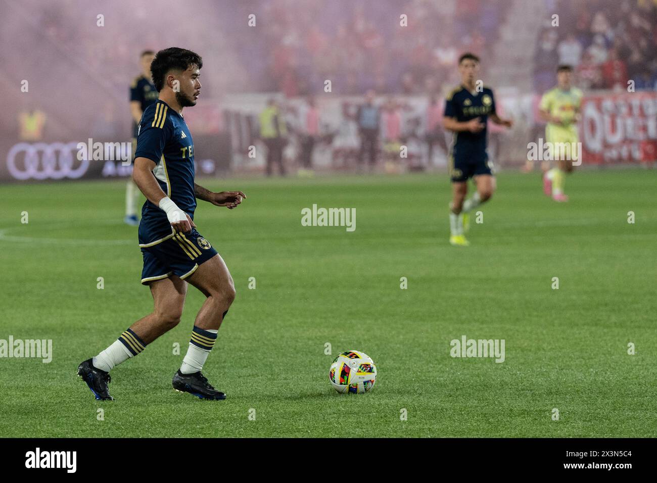 Harrison, USA. 27th Apr, 2024. Ryan Raposo (7) of Whitecaps FC controls ...