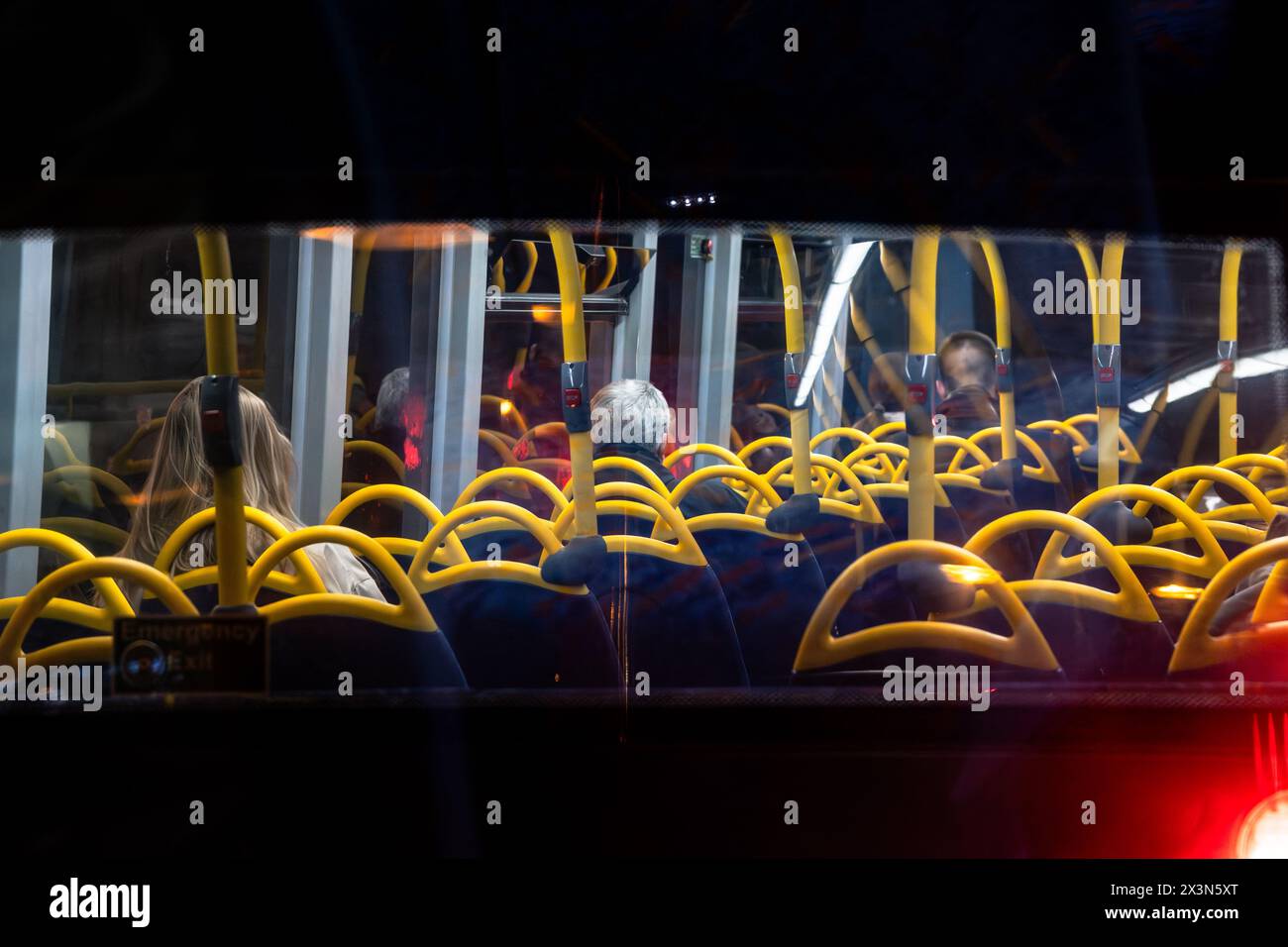 View from the rear window of a London double decker bus of passengers ...