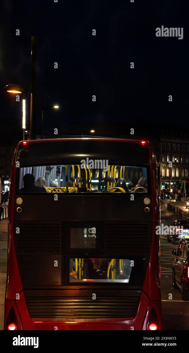 View from the rear of passengers or commuters inside a London double ...