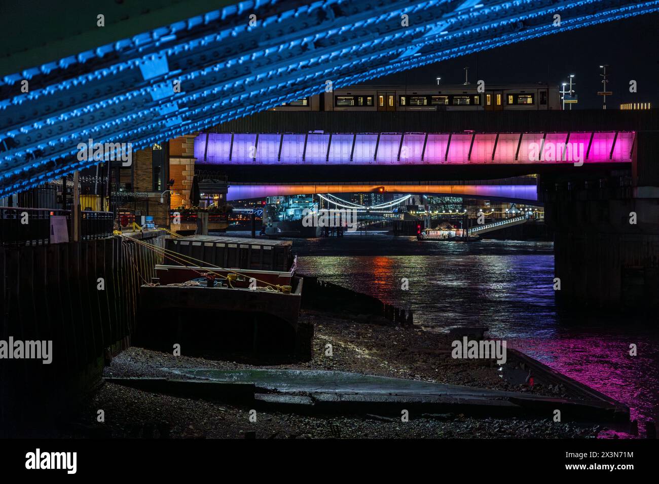 Detail of rivets and the steel structure of a London bridge underneath ...