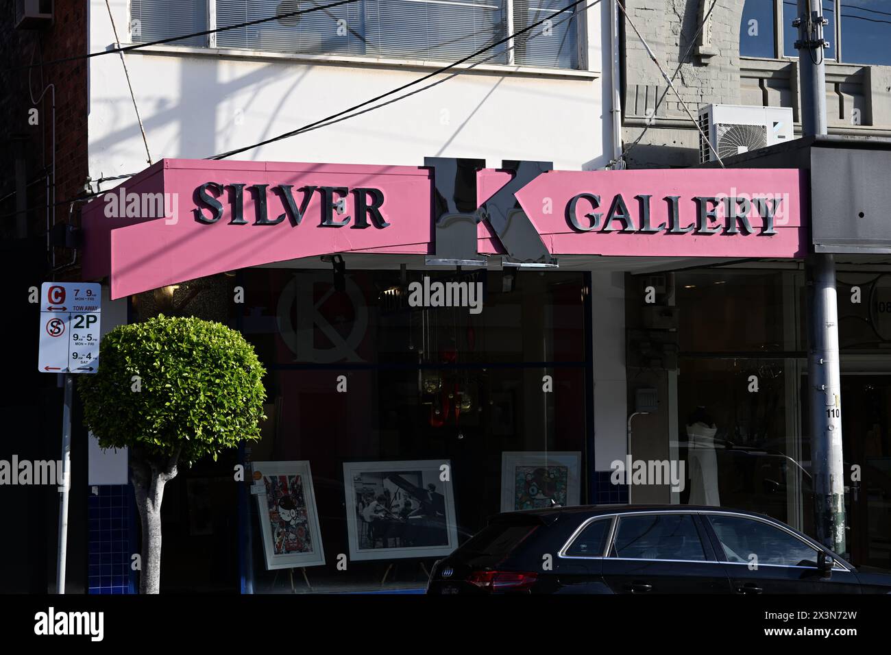 Exterior of Melbourne's Silver K Gallery, with pink sign above its ...