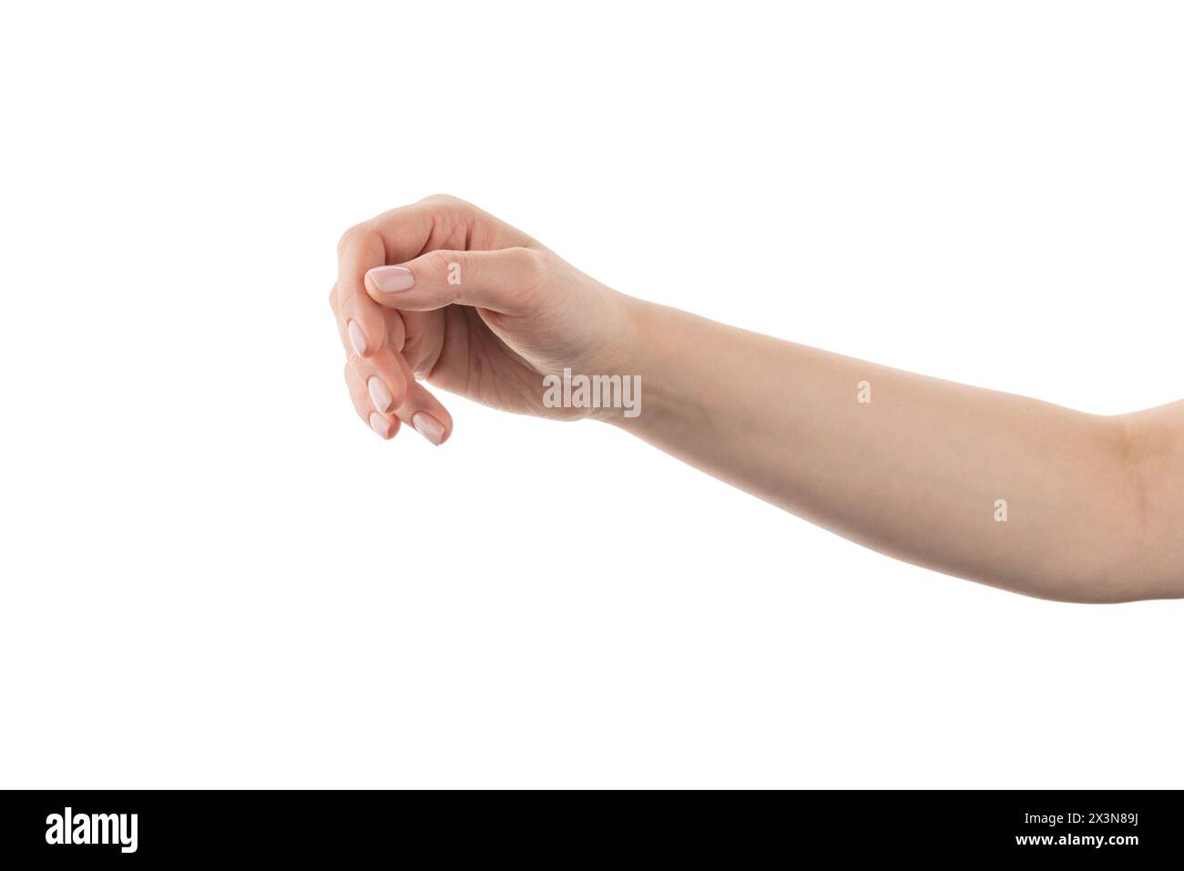 Young woman hand holding something like a business card with fingers isolated on white ...