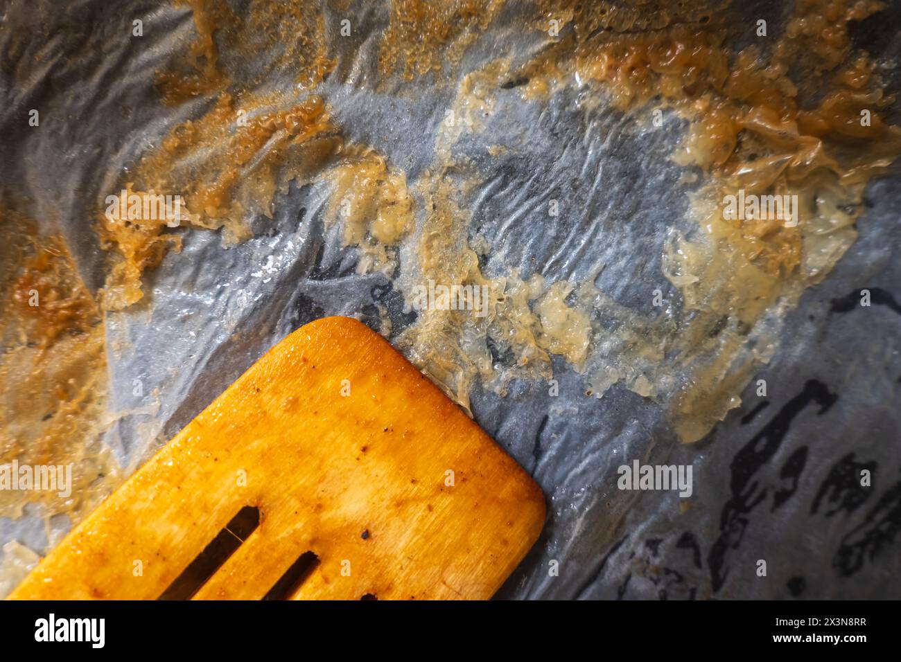 Dirty dish wooden spoon kitchen hi-res stock photography and images - Alamy