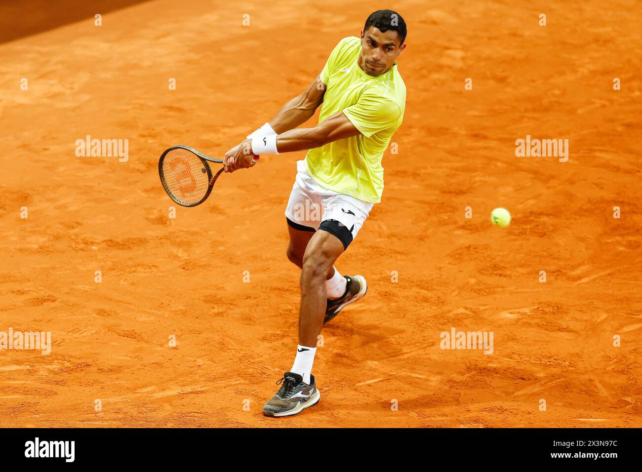 Thiago Monteiro of Brazil in action against Stefanos Tsisipas of Greece ...