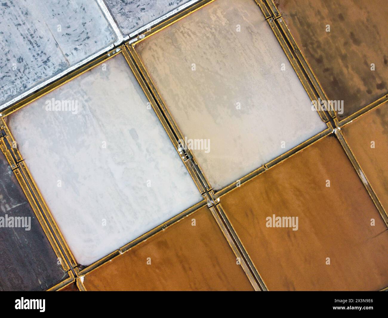 the different colors of the salt pans seen from above Stock Photo - Alamy