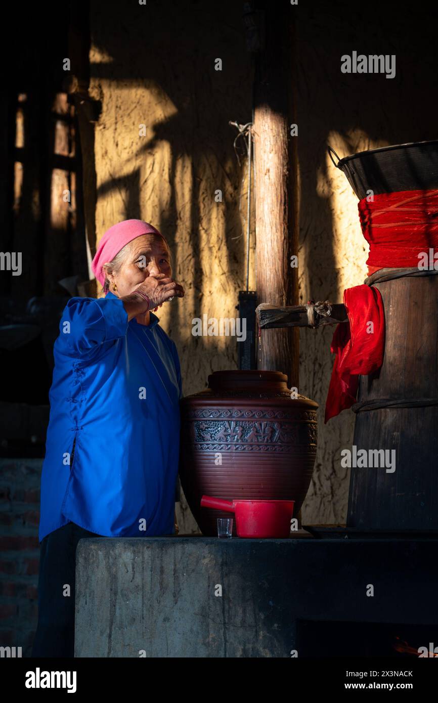 Hmong woman drinking rice wine, Bac Ha, Lao Cai Province, Vietnam Stock ...