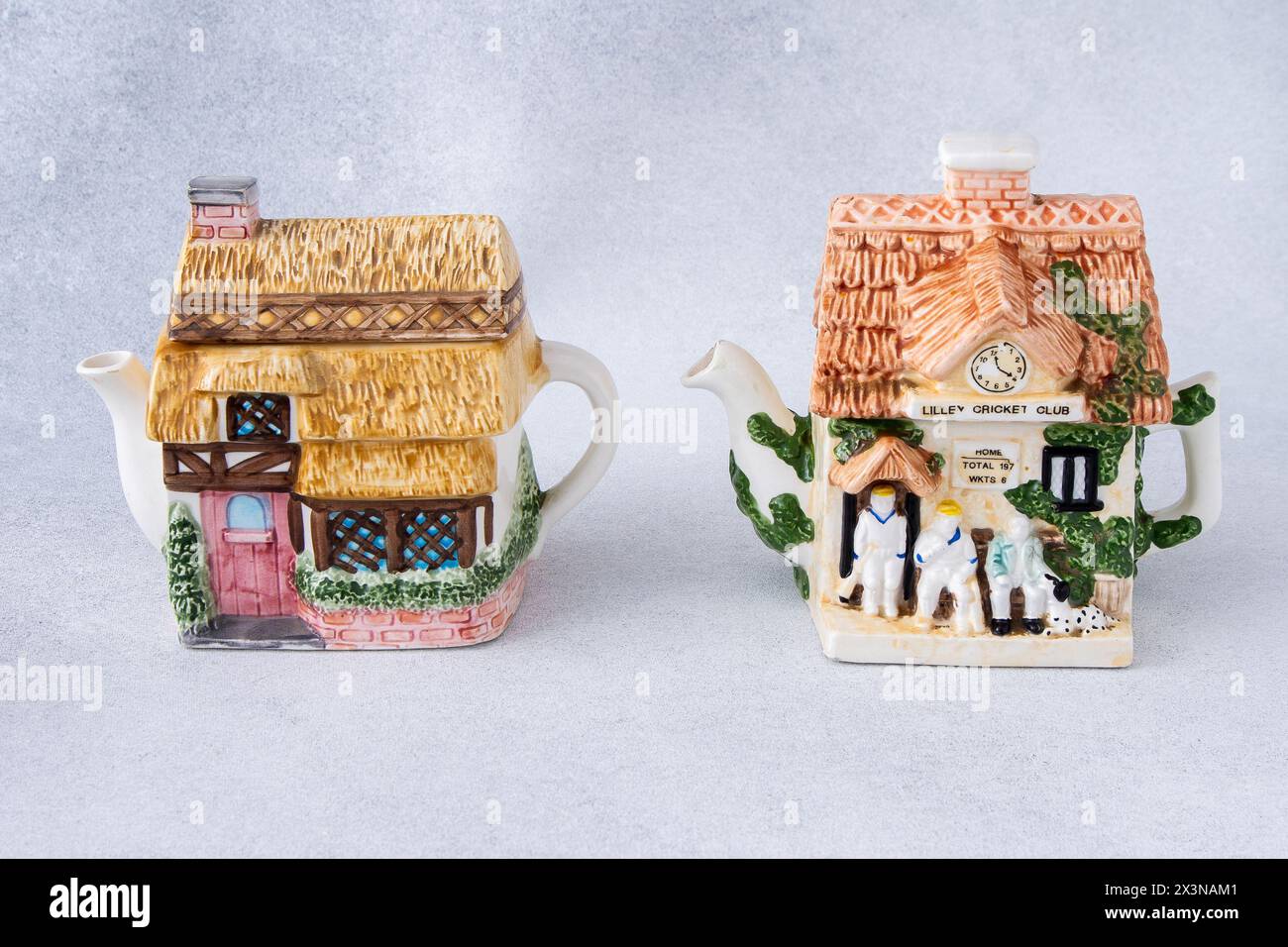 A kettle in the shape of a house. Antique porcelain tea pot Stock Photo ...