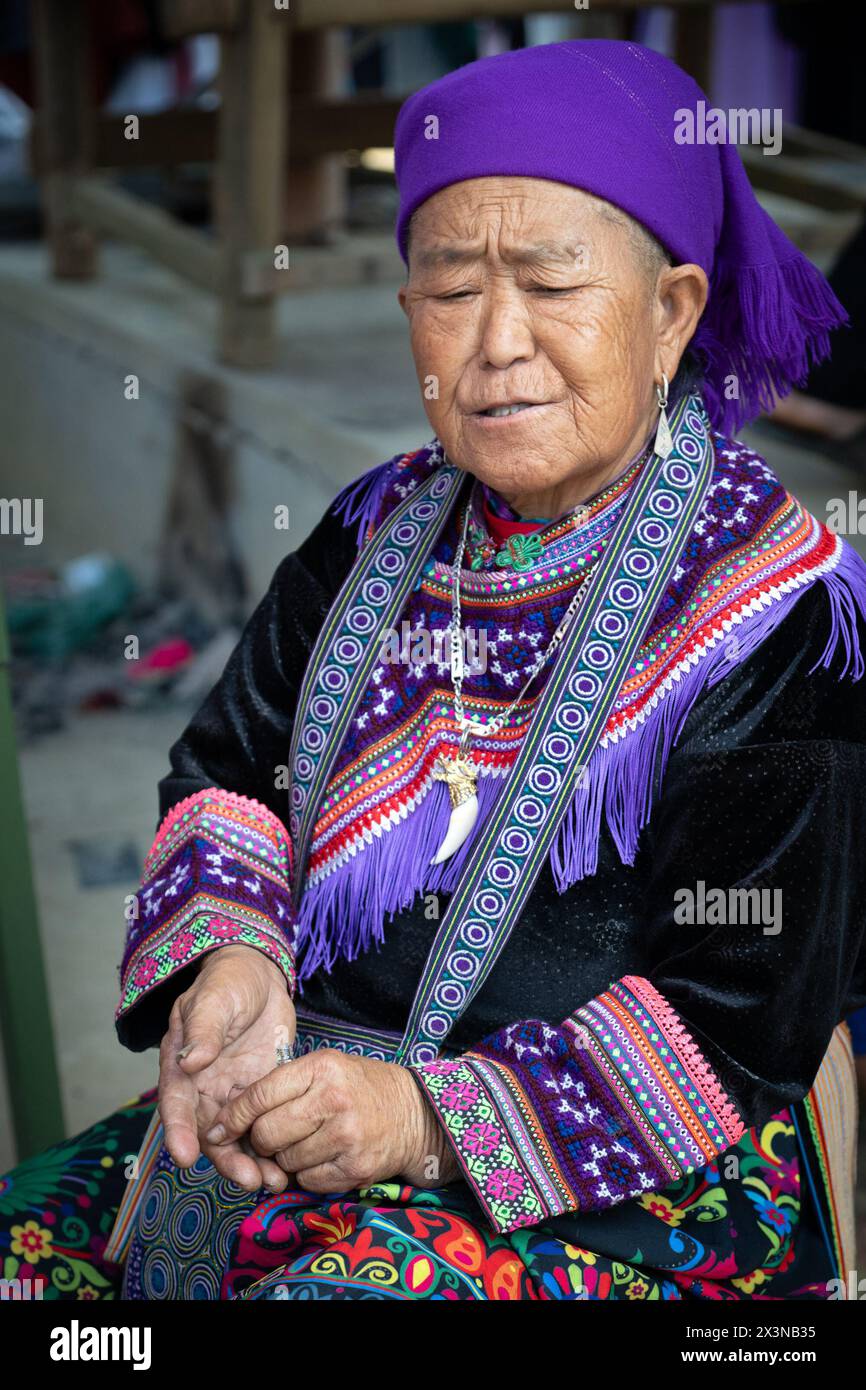 Portrait of an elderly Black Hmong woman at the Can Cau Market in Lao ...
