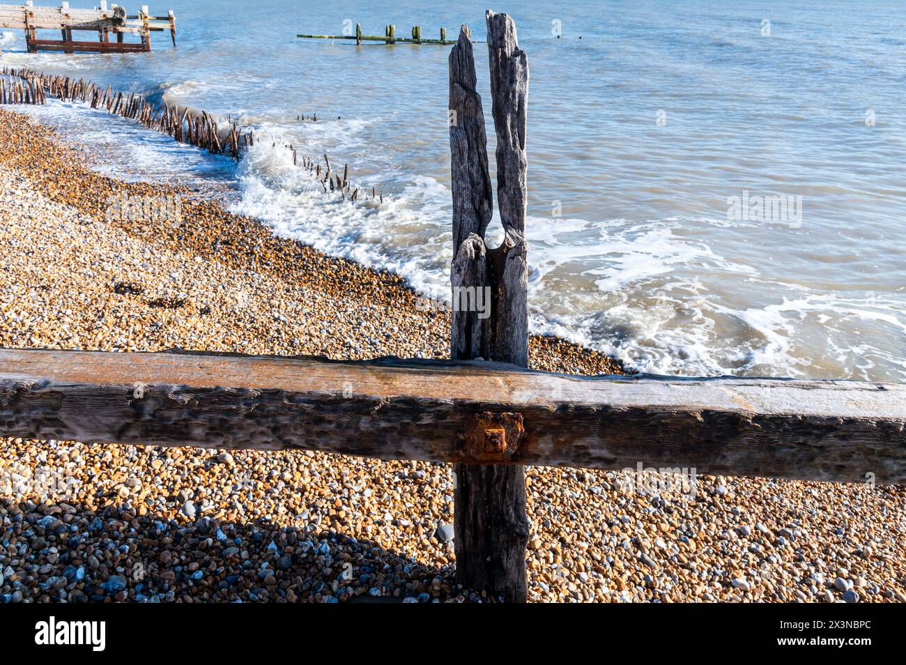 Old wooden sea defences at Rye Harbour Nature Reserve, East Sussex ...