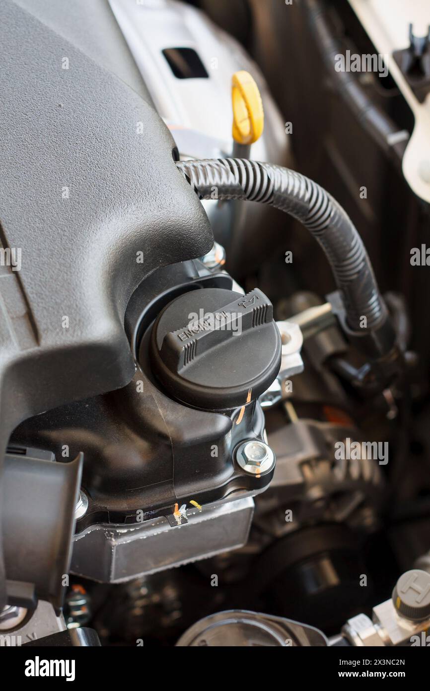closeup engine oil cap in car engine Stock Photo - Alamy