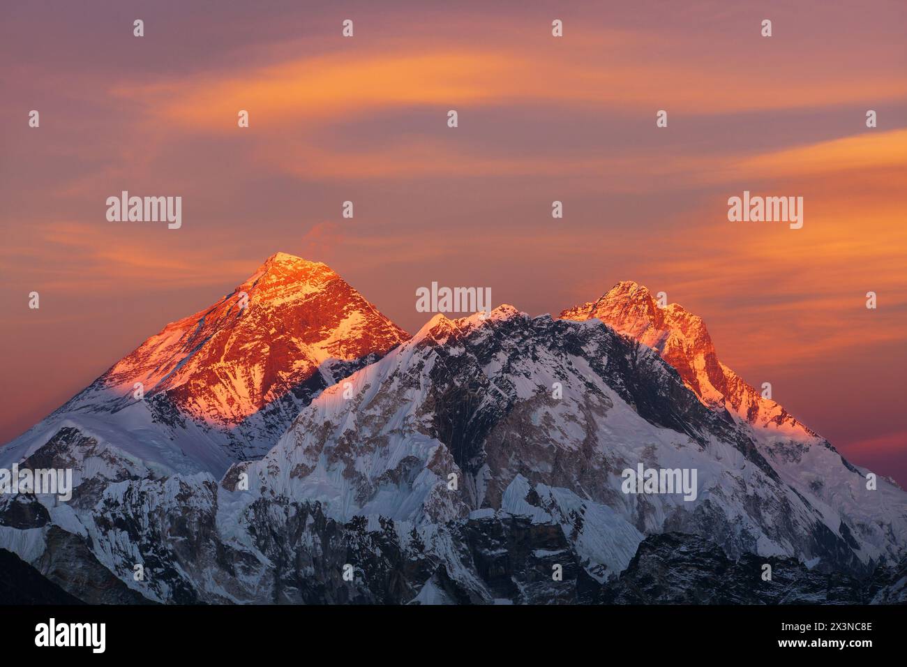 Evening sunset view of Mount Everest and Lhotse from Renjo pass. Three ...