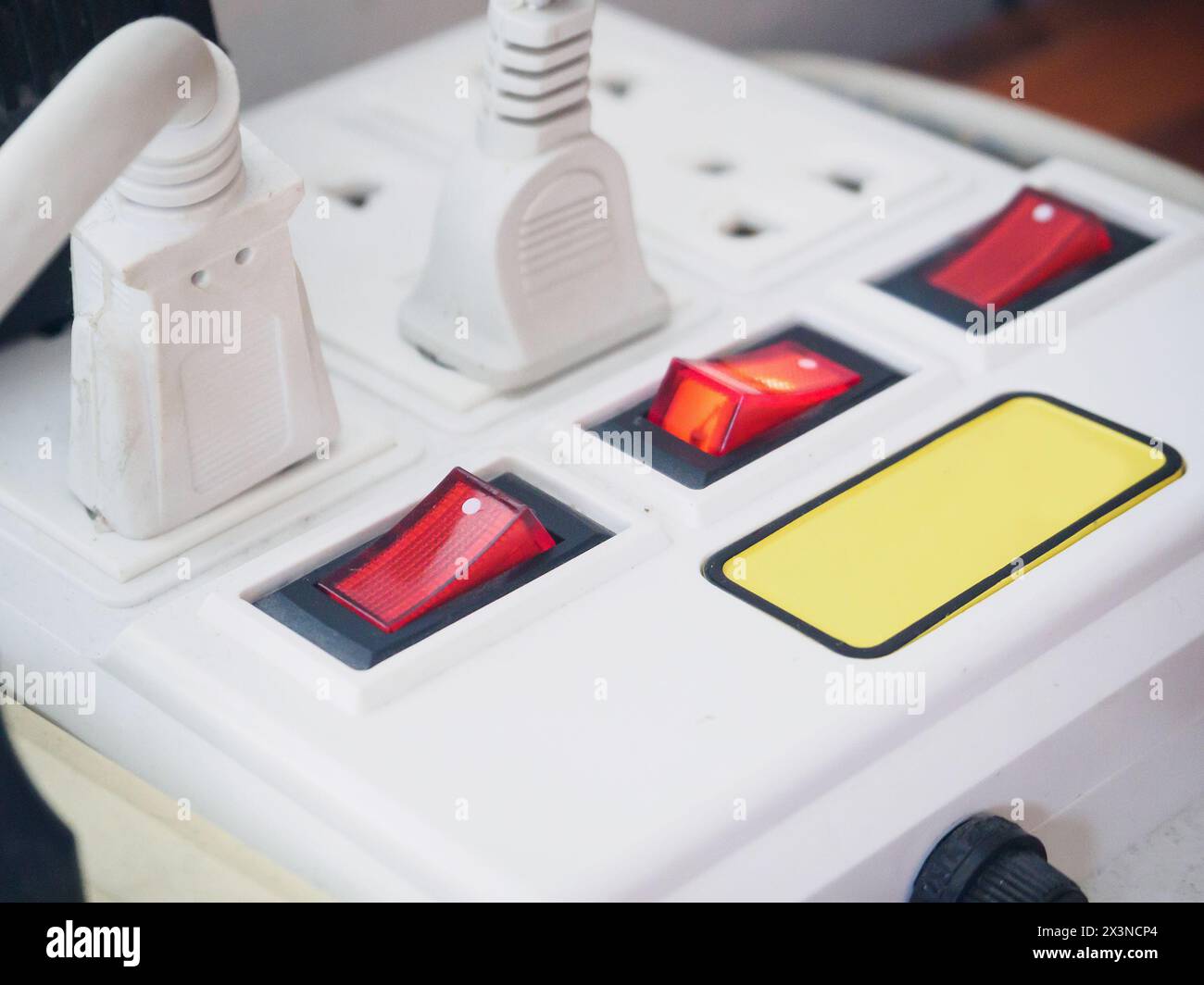 Multiple power socket with connected plugs Stock Photo - Alamy