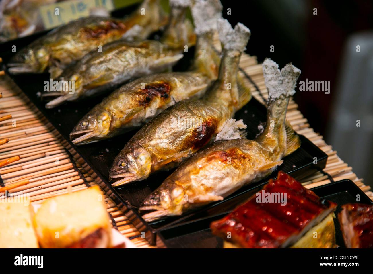 Ayu sweet fish in a market stall in Nishiki fish market in Kyoto, Japan ...