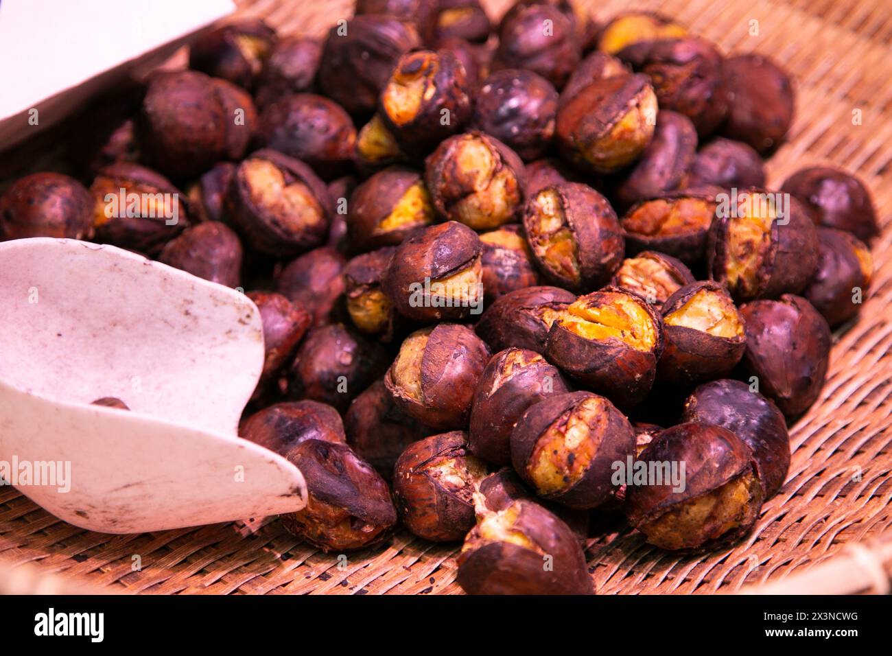Roasted chestnuts at a market in Osaka, Japan Stock Photo - Alamy