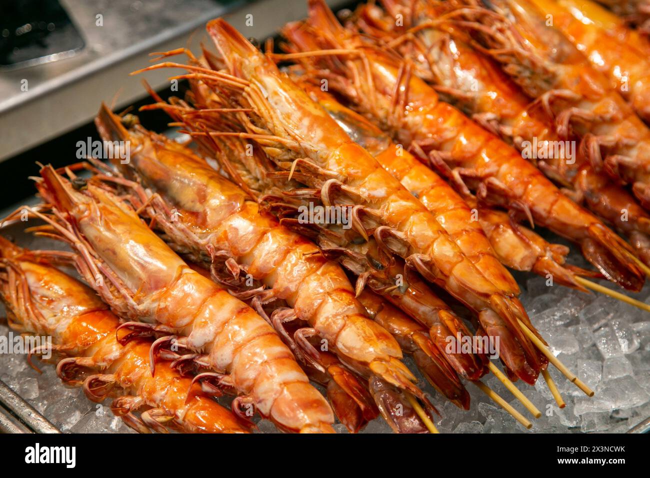 Seafood shell and fish cooked on a grill at the Osaka fish market in ...