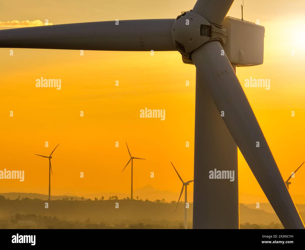 Wind farm field and sunset sky. Wind power. Sustainable, renewable ...