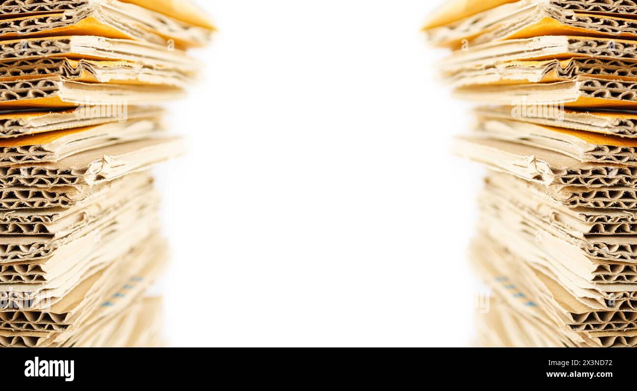 Cardboard stack isolated on white background Stock Photo - Alamy