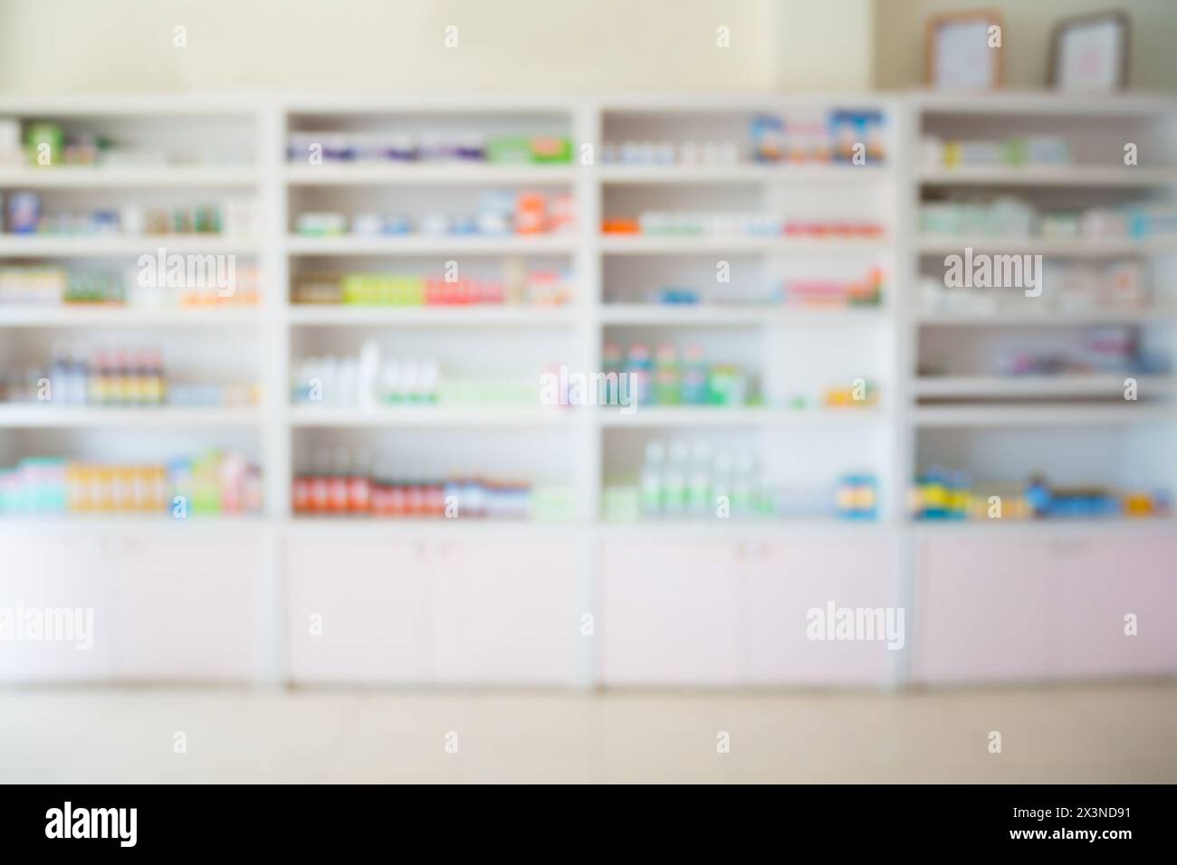 blur pharmacy store shelves filled with medicines arranged in shelves ...