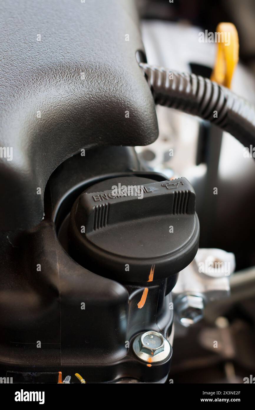closeup engine oil cap in car engine Stock Photo - Alamy