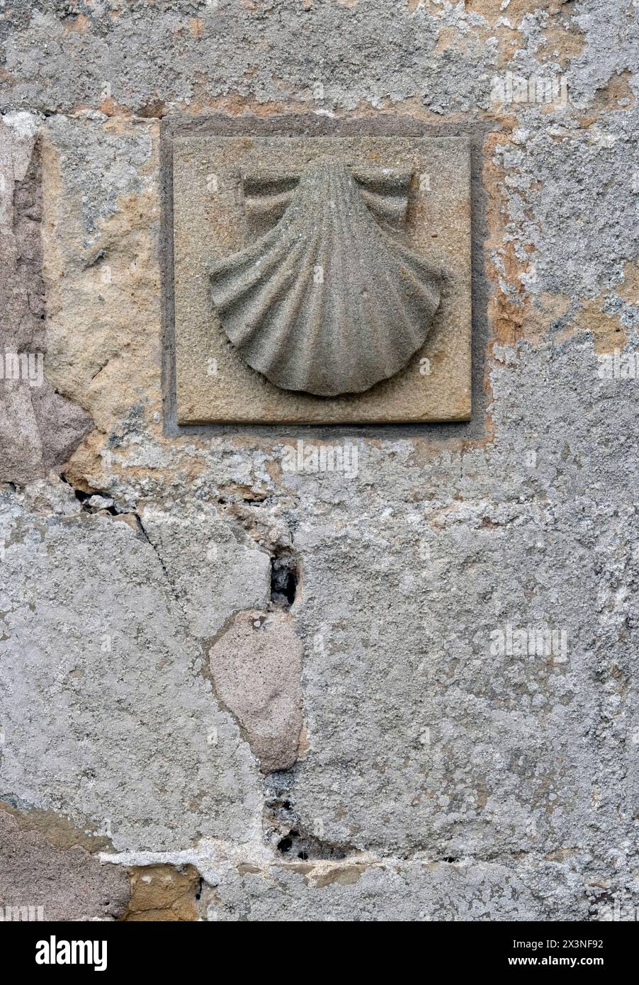 Scallop shell symbol on a church along the Camino de Santiago ...
