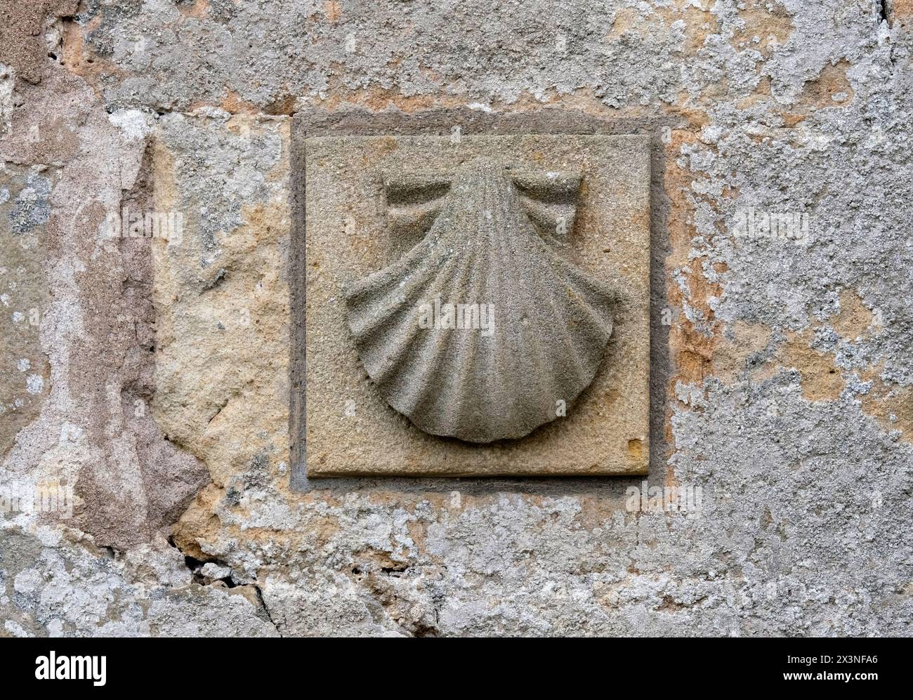 Scallop shell symbol on a church along the Camino de Santiago ...