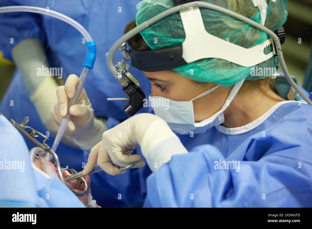 Tonsillectomy, Surgeons performing a tonsillectomy tonsil removal ...