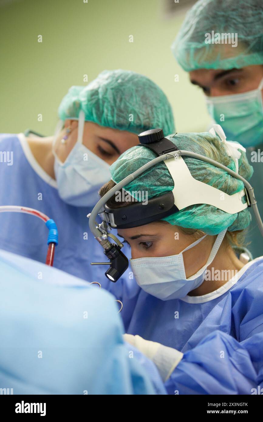 Tonsillectomy, Surgeons performing a tonsillectomy tonsil removal ...