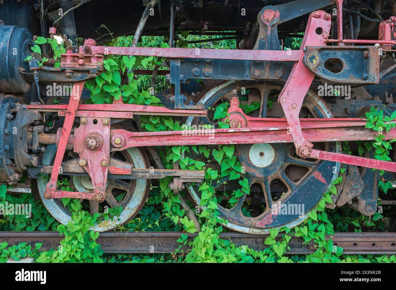 The partly dismantled, rusting remains of vintage steam engines lined ...